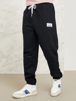 Buy Styli Heavy Fleece Panel Joggers with Wide Drawcord & Badge Detail ...
