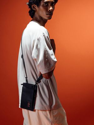 Buy DailyObjects Monkey Shoulder X Do Utility Phone Sling Bag Online