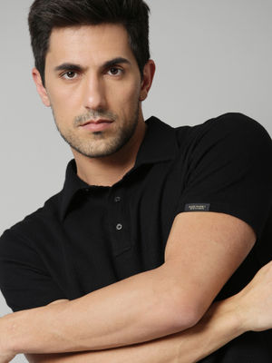 RARE RABBIT Polo T-Shirts : Buy RARE RABBIT Black Solid Polo T-Shirt ...