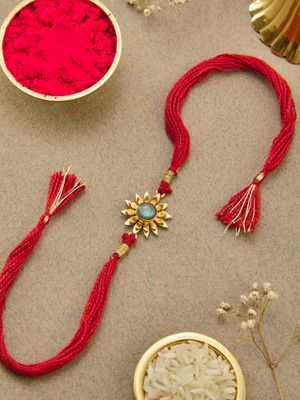 Buy Fabindia Women Gold Solid Rakhi with Roli and Chawal Online
