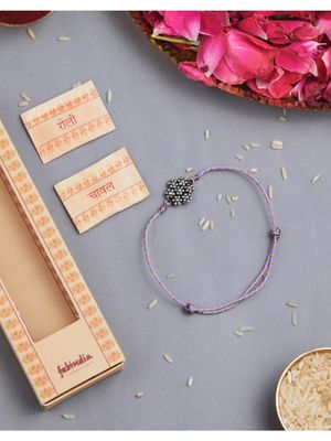 Fabindia Fashion Rakhis : Buy Fabindia Silver Flower Rakhi Online ...
