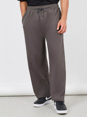Buy Styli Men's Charcoal Solid Wide Leg Open Hem Cotton Joggers Online