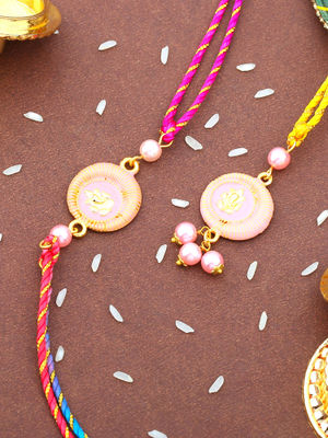 Buy Estele Rhodium Plated Divine Ganesh Bhaiya Bhabhi Rakhi with Multi Coloured Silk Thread Online