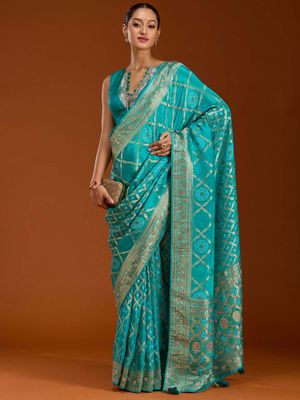 Buy Koskii Turquoise Blue Stonework Woven Silk Saree with Unstitched Online