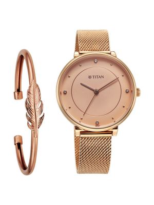 Buy Titan Purple Stackable Quartz Analog Peach Dial Watch for Women ...