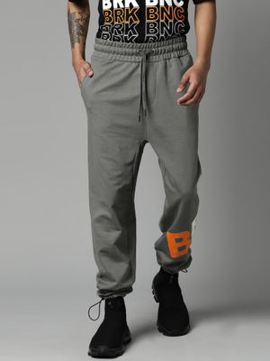 Buy Breakbounce Men Printed Loose Fit Grey Knitted Joggers online