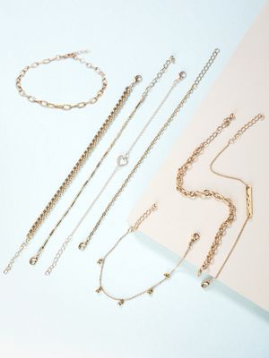 Buy Zaveri Pearls Set of 8 Gold & Rose Gold Contemporary Bracelets ...